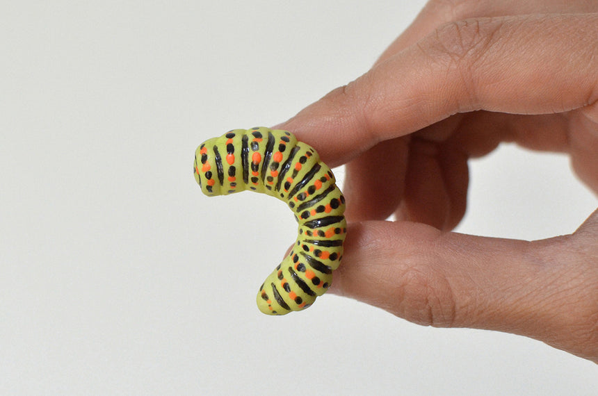 Pin - Caterpillar – Red Dot Design Museum Singapore